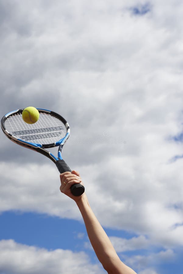 Hand with racket and ball stock photo. Image of play - 74565136