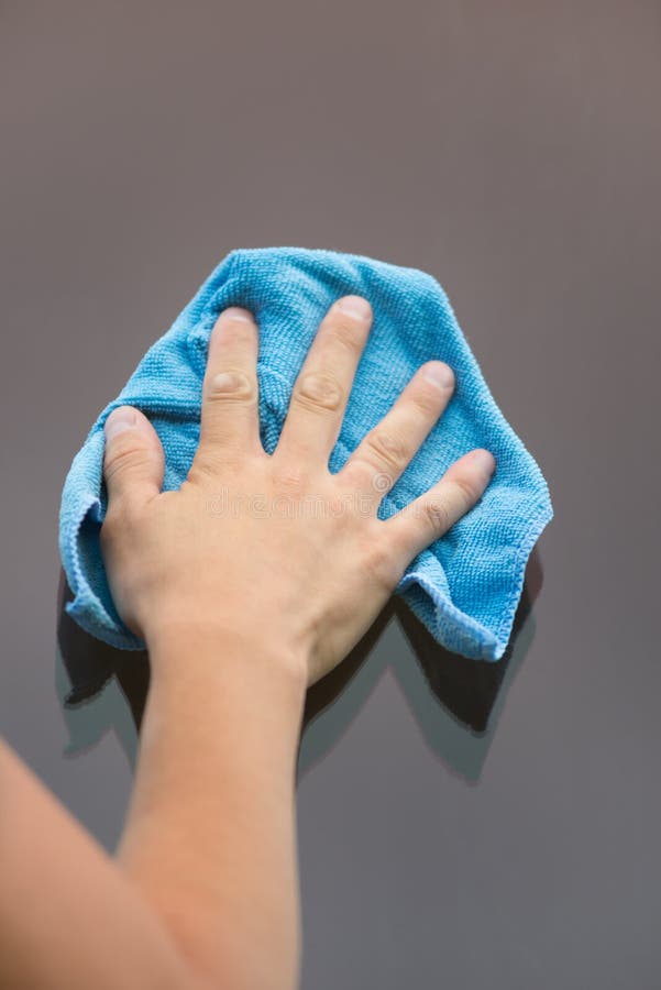 The Hand with the Rag in the Background Stock Image - Image of light ...