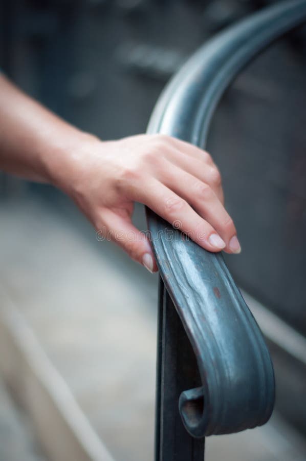 Hand on the railing stock image. Image of holding, help - 76364725