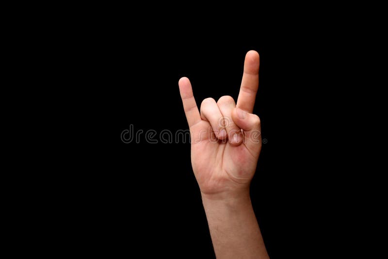 Hand Raised Up with Fingers in the Shape of Devil Symbol Stock Photo ...