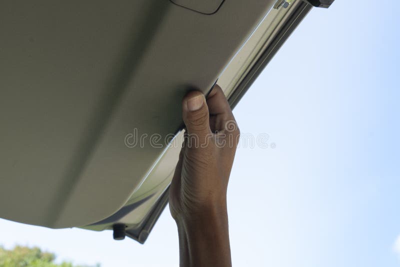 Hand Reaching for the Back Door of the Car To Close it. Stock Image ...