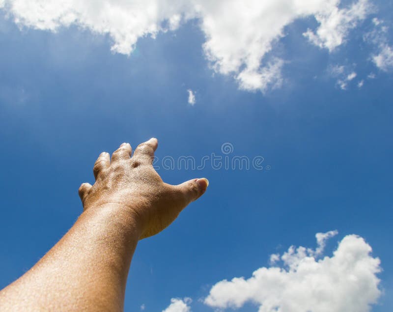 Hand Reaching For Sky