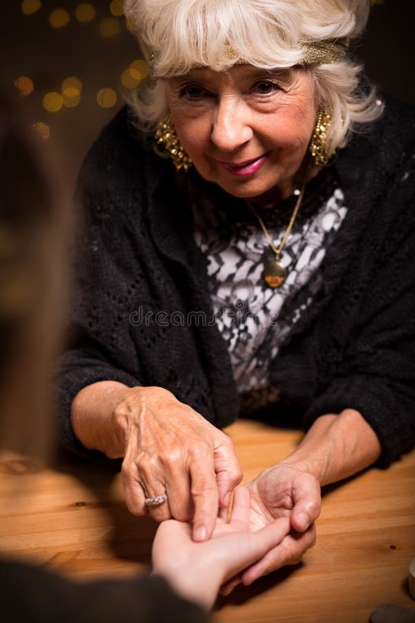 Hand reader telling future stock image. Image of astrology - 56549345