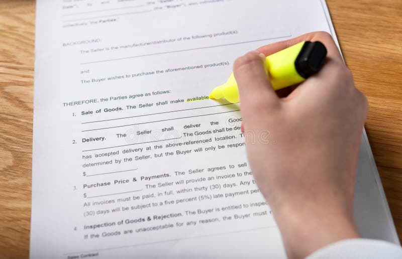 Hand Reading Contract and Highlighting AVAILABLE Word in Agreement ...