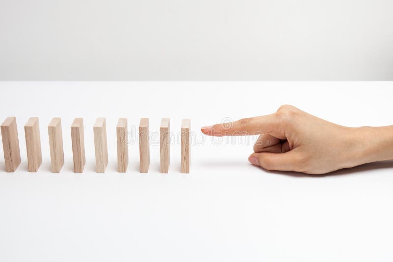 Finger Pushing Domino Pieces Stock Photo - Image of background, hand ...