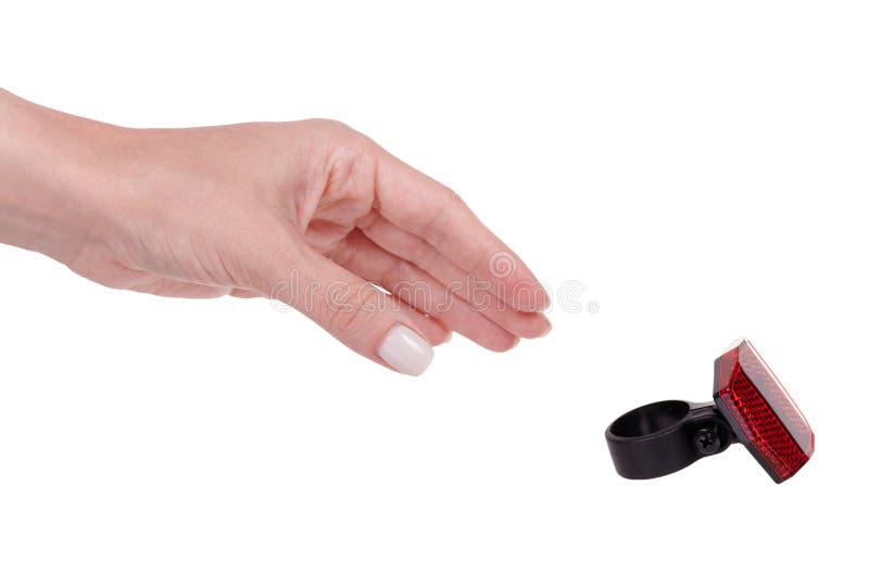 Hand with Red Bicycle Reflector for Safety. Isolated on White ...