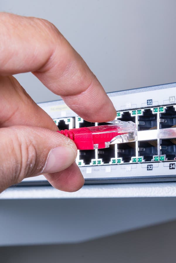 Hand with Red Ethernet Cable Stock Photo - Image of links, closeup ...