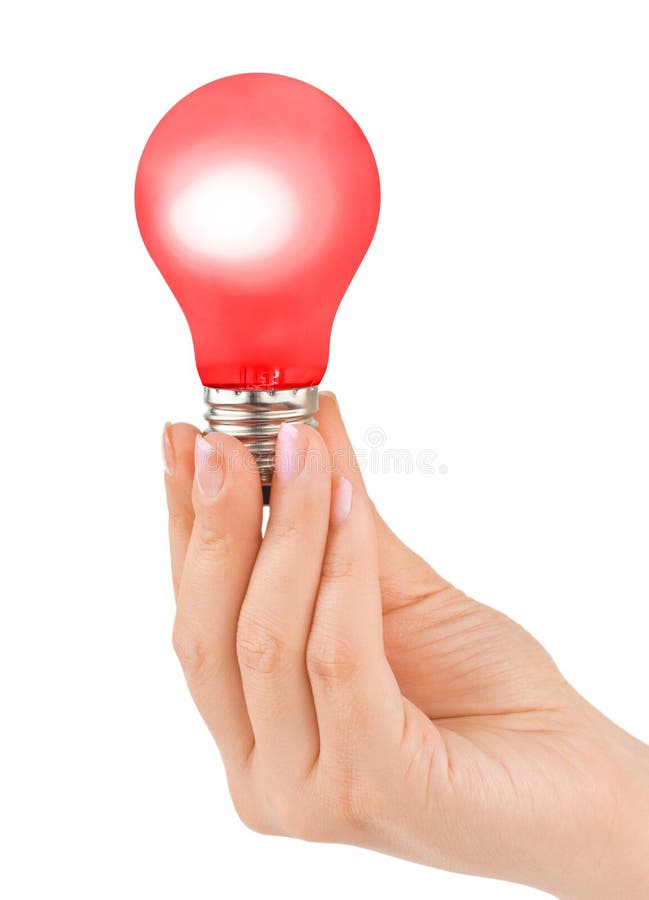 Hand with lamp and plant stock photo. Image of inspiration - 9825726