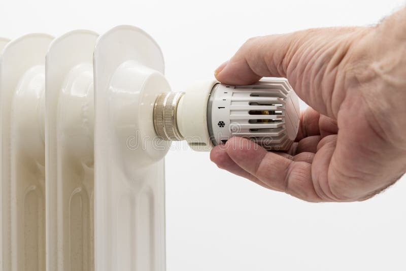 Hand Regulating a Heating Radiator, Isolated on White Stock Image ...