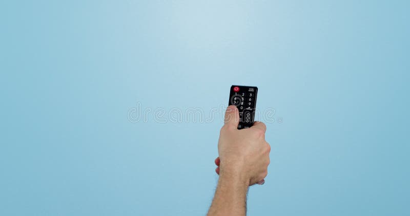 Hand, Remote and Changing Channels on Tv and Isolated in Studio by Blue ...