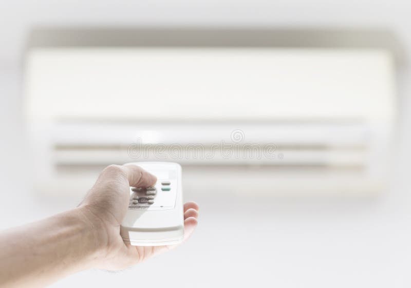 Hand with Remote Control Air Conditioner Technology Stock Image - Image ...