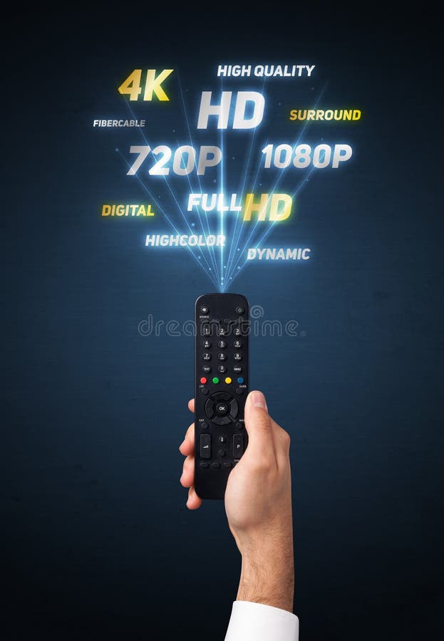 Hand with Remote Control and Multimedia Properties Stock Photo - Image ...