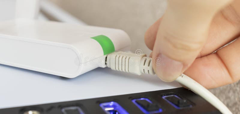 Hand Removing Plug from Outlet, USB Charger Stock Photo - Image of plug ...