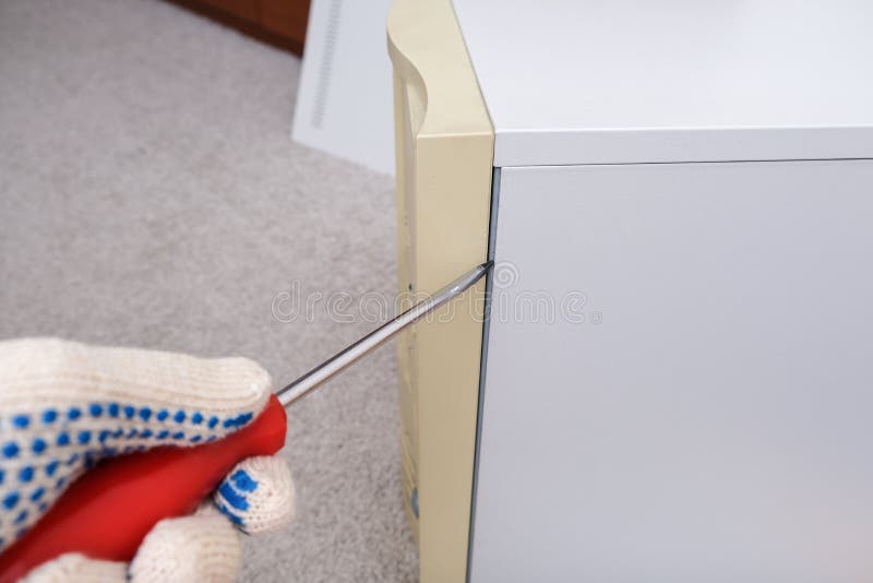 A Hand of a Repairer Opening a Case of a Computer, System Unit Repair ...