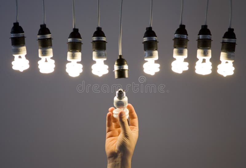 Hand replacing light bulb stock photo. Image of change - 5112386