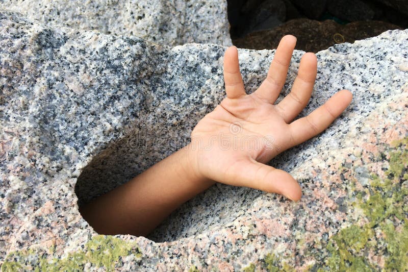 Hand Request Help from Big Stone Hole Stock Image - Image of business ...