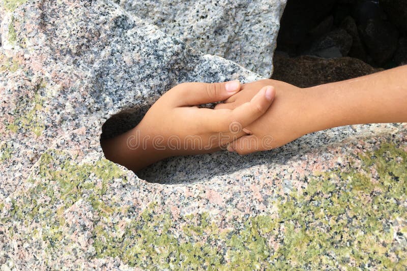 Hand Request Help from Big Stone Hole Stock Image - Image of save ...