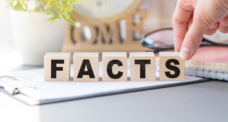 Hand Reveals that a Facts by Flipping Two Cubes. Stock Photo - Image of ...