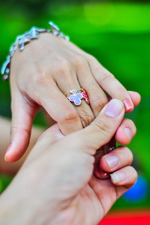 Hand with the ring stock photo. Image of clasped, adult - 24666302