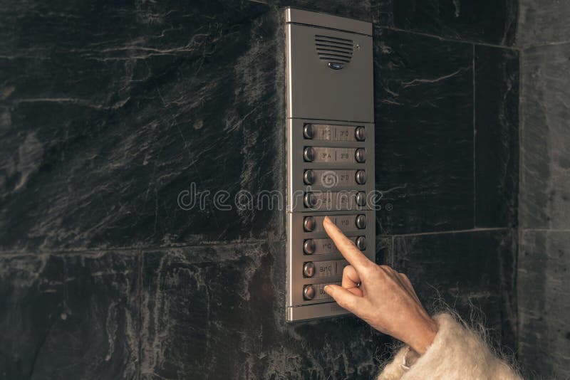 Hand ringing on intercom stock photo. Image of protection - 235359876