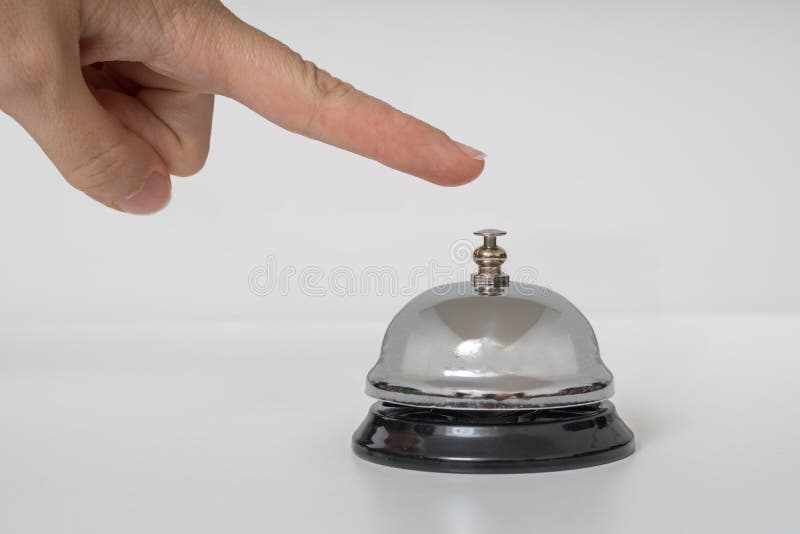 Hand is Ringing Silver Service Bell on White Background Stock Photo ...