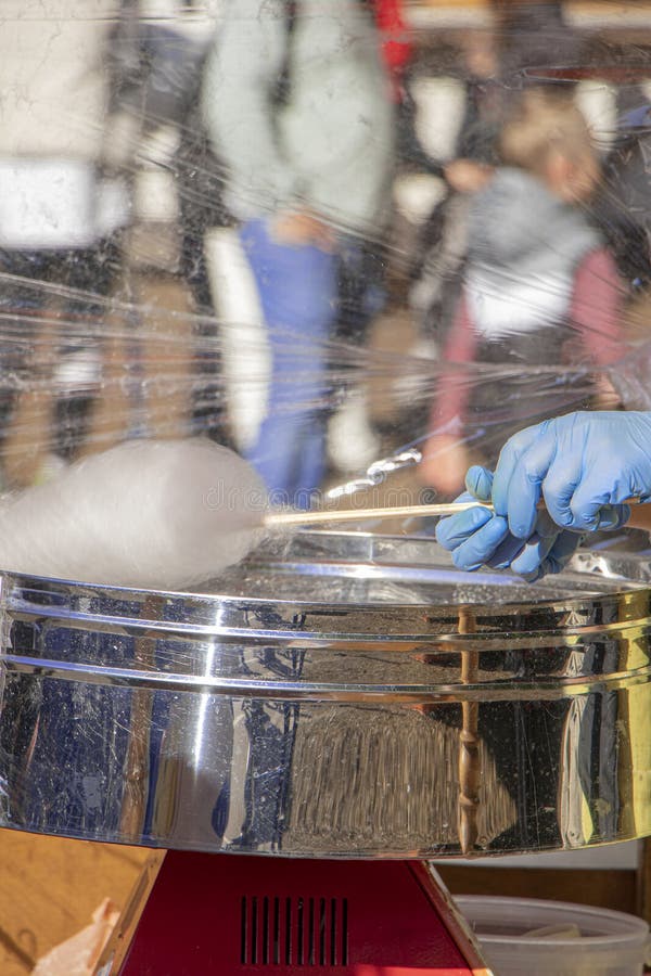 Hand Rolled Cotton Candy into Candy Thread Machine. Candy Making Stock ...