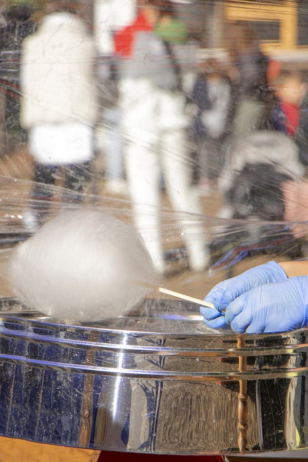 Hand Rolled Cotton Candy into Candy Thread Machine. Candy Making Stock ...