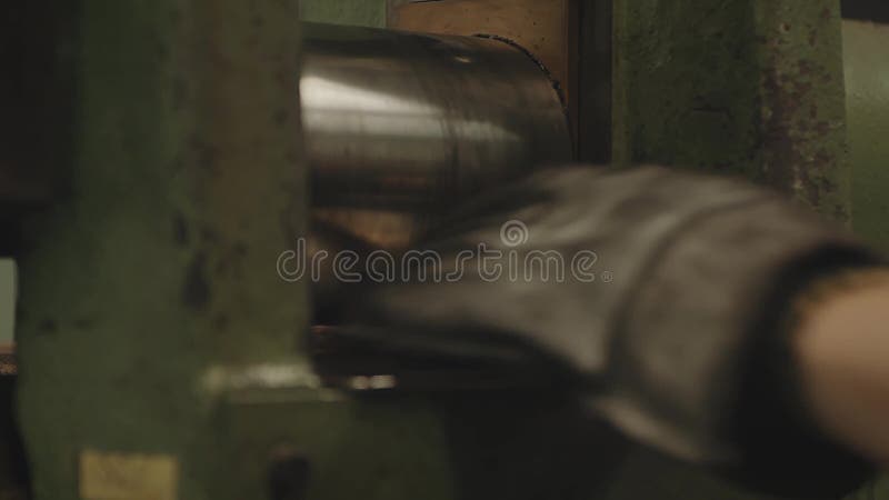 Hand-rolled Gold Bars. Factory Worker Processing Roll of Steel Sheet ...