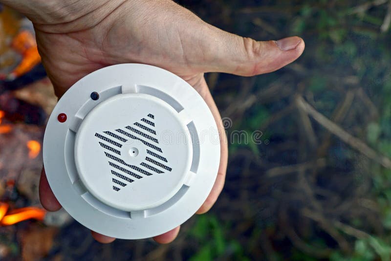 Hand with a Round White Smoke Sensor Stock Image - Image of security ...