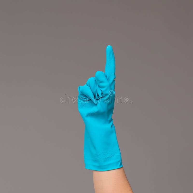 Hand in Rubber Glove Points Upwards with Index Finger. Neutral ...