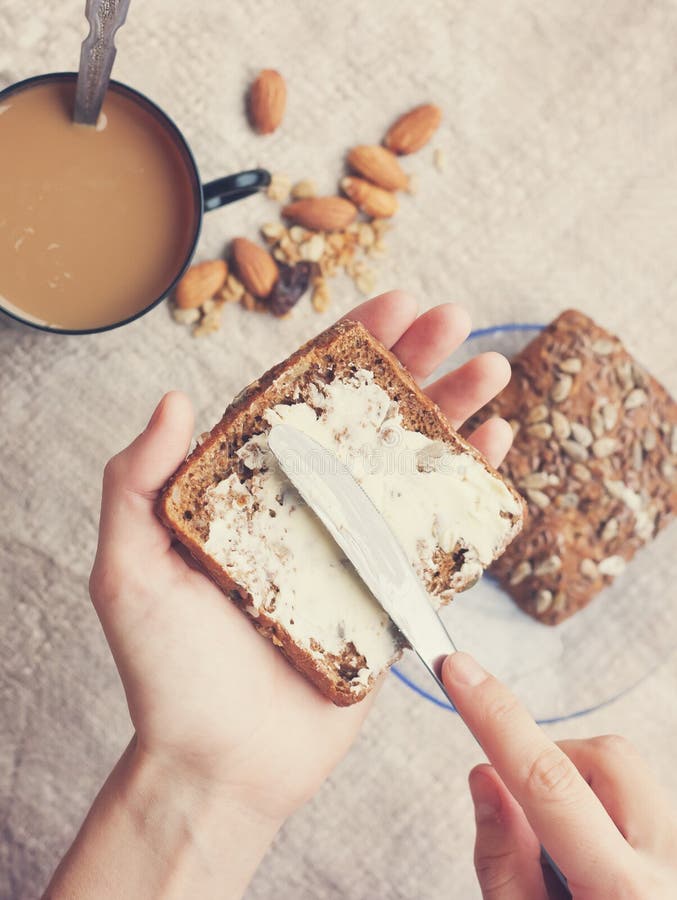 Hand Rubs Butter on Piece of Rye Bread Stock Photo - Image of close ...