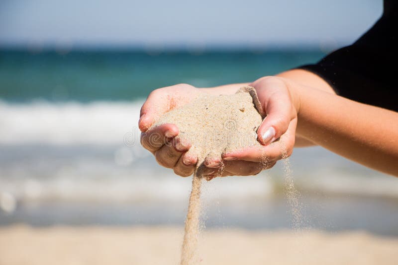 Hand holding sand. stock photo. Image of fingers, finger - 134684774