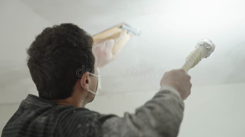 Hand Sanding of the Plasterboard Ceiling with a Trowel Stock Footage ...