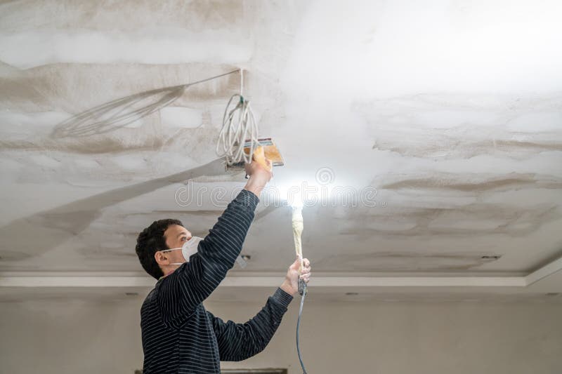 Hand Sanding of the Plasterboard Ceiling with a Trowel Stock Image ...