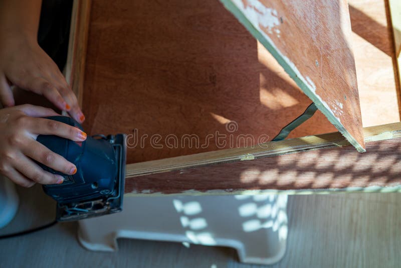 Hand Sanding Wood with a Machine in the Craftsman Workshop Stock Image ...
