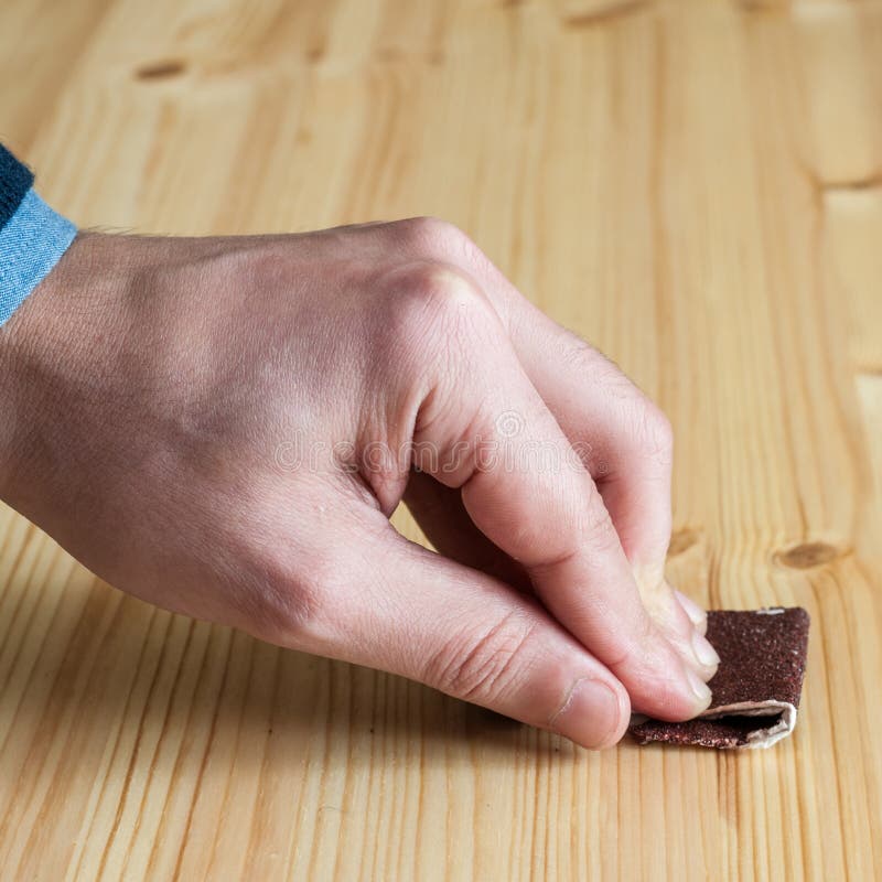 Restoring a wood furniture stock photo. Image of sandpaper - 105014152