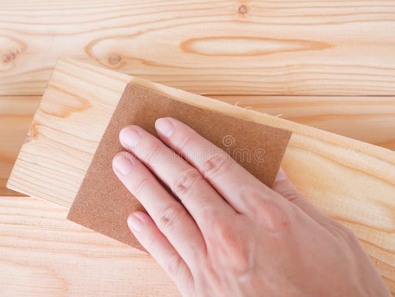 Hand sanding wooden pallet stock image. Image of smoothing - 203779031