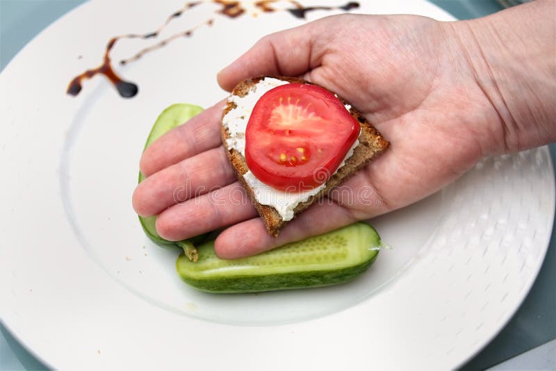 Hand with Sandwich stock photo. Image of overhead, cucumber - 71581390