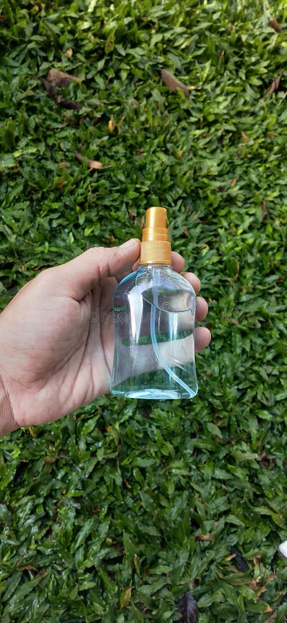 Hand Sanitizer Spray, Beautiful Green Grass Background Stock Photo ...