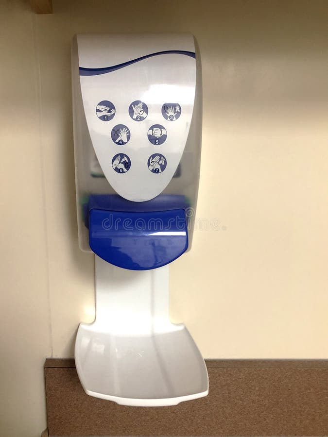 Hand Sanitizer Wall Mounted Dispenser with Liquid Sanitizer at a ...
