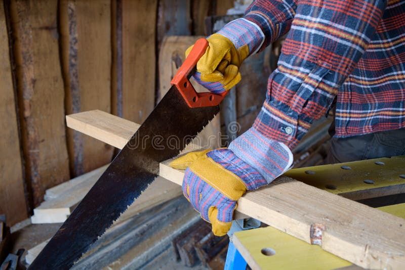Hand saw cutting boards stock photo. Image of carpentry - 40292928