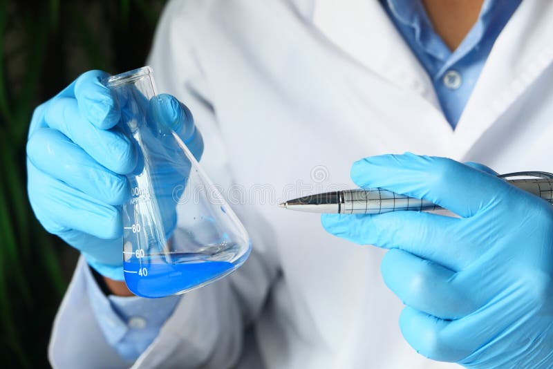 Hand of Scientist Holding Lab Glassware Top Down. Stock Photo - Image ...