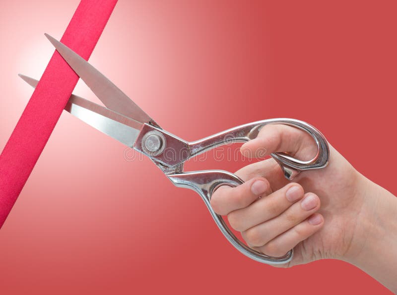 Hand with Scissors Cutting a Red Ribbon. Grand Opening Stock Image ...