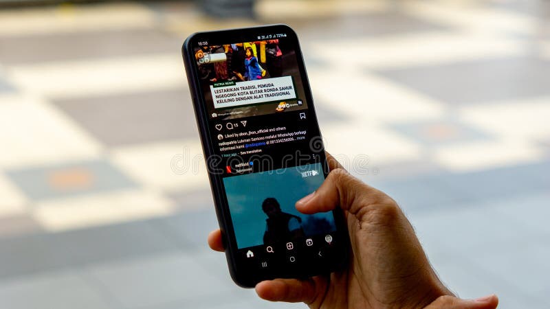 A Hand is Scrolling Instagram Looking for Some Entertainment in Leisure ...