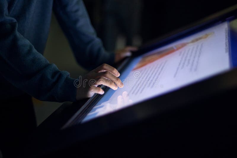 Hand Scrolls Information on the Touch Screen in the Mall Stock Photo ...
