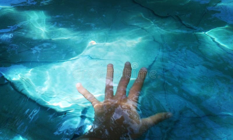 Hand & Sea stock image. Image of hand, mano, agua - 90838341