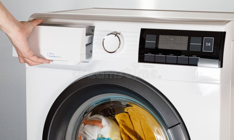 The Hand Select Settings for Laundry on Modern Digital Display. Close ...
