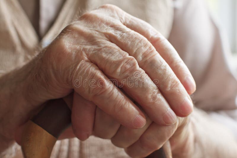Two Senior Citizens Holding Hands Stock Photo - Image of hands ...