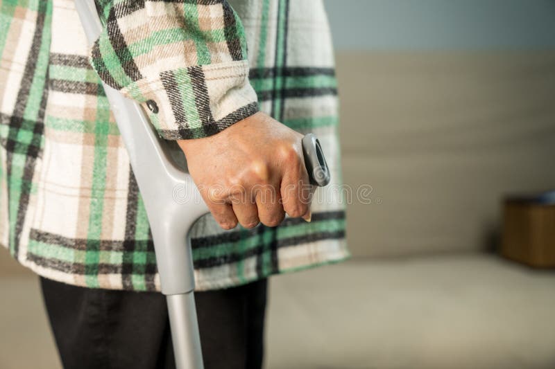 Hand of Senior Woman on a Crutch Stock Photo - Image of alone, lady ...