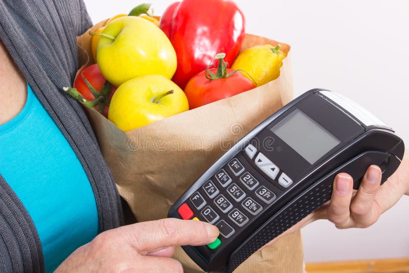 Hand of Senior Woman Using Payment Terminal. Enter Personal ...